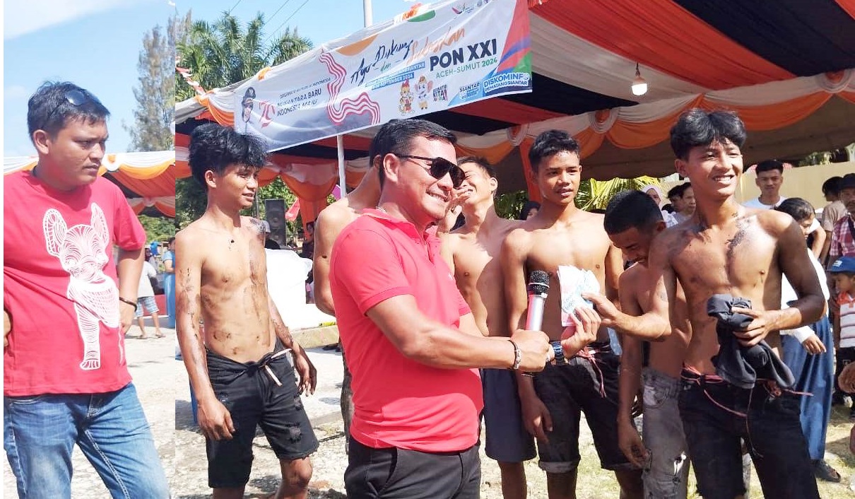 Andika Prayogi Sinaga Ketua PAC Pemuda Pancasila Siantar Barat didampingi Rico Sinaga Ketua ...